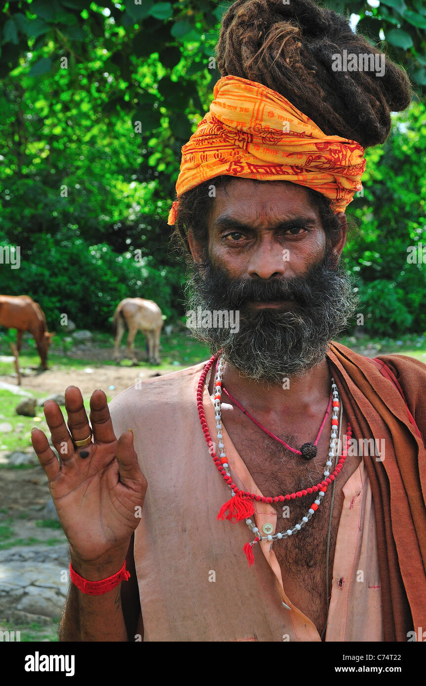 Sadhu by the Ganges river in the holy town Stock Photo - Alamy