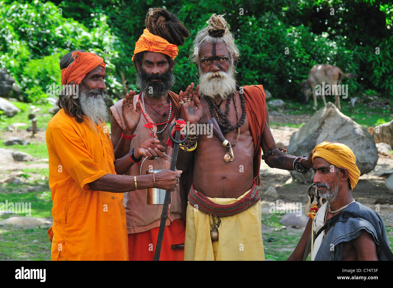 Sadhus at the little pass by the Ganges river in the holy town Stock ...