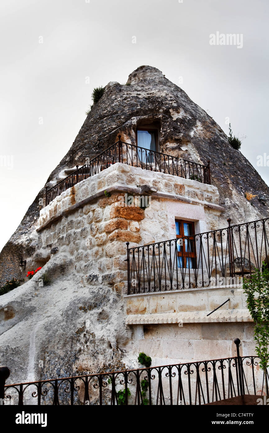 Renovation of a limestone cave with layers of balconies forming ...