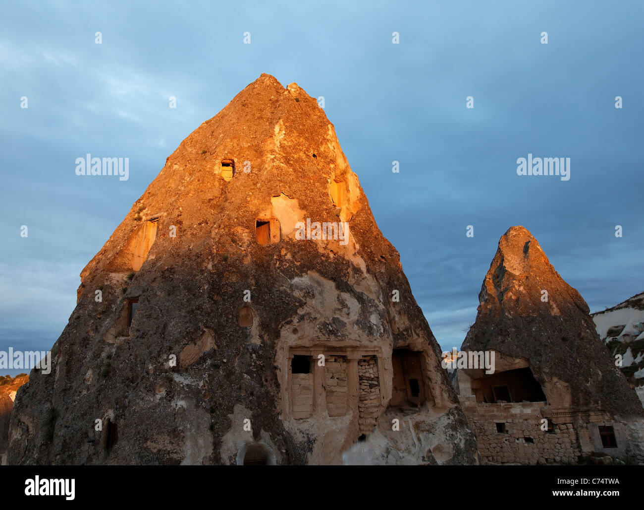landscape of early morning sun rays falling on Goreme fairy chimney ...