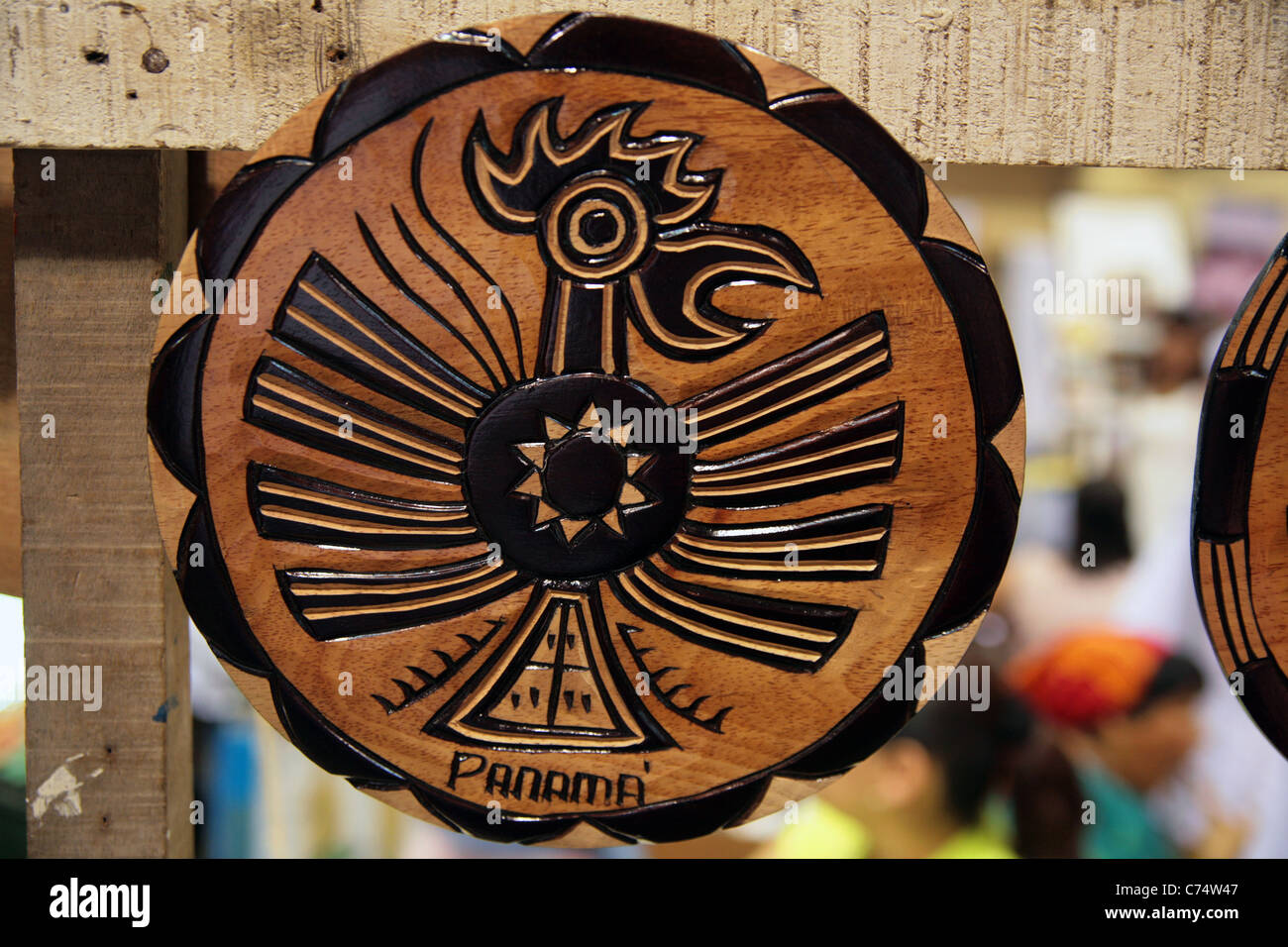 Plates with traditional panamanian wood carvings Stock Photo - Alamy