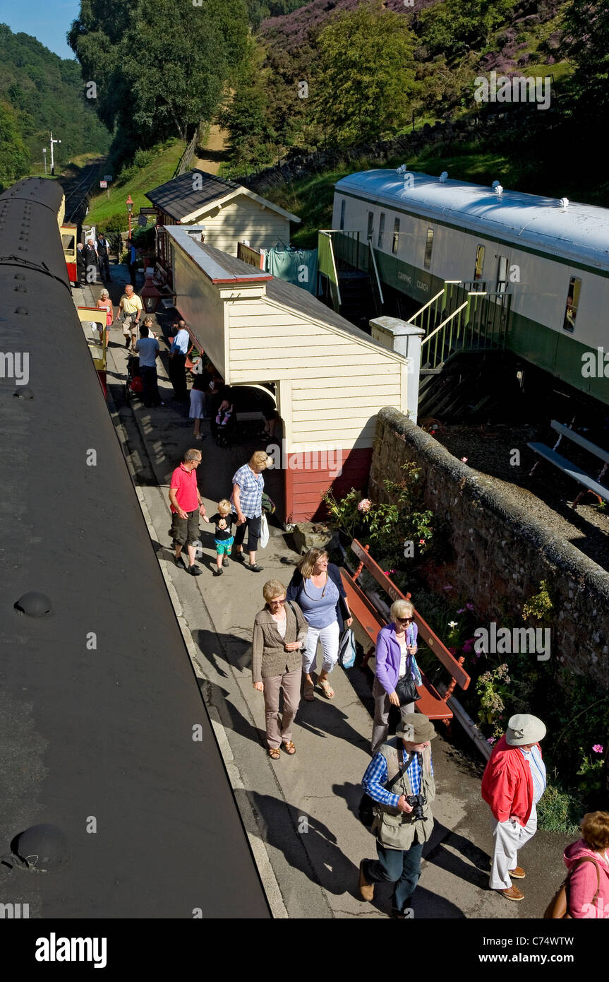Passengers leaving train at Goathland Station in summer North Yorkshire ...