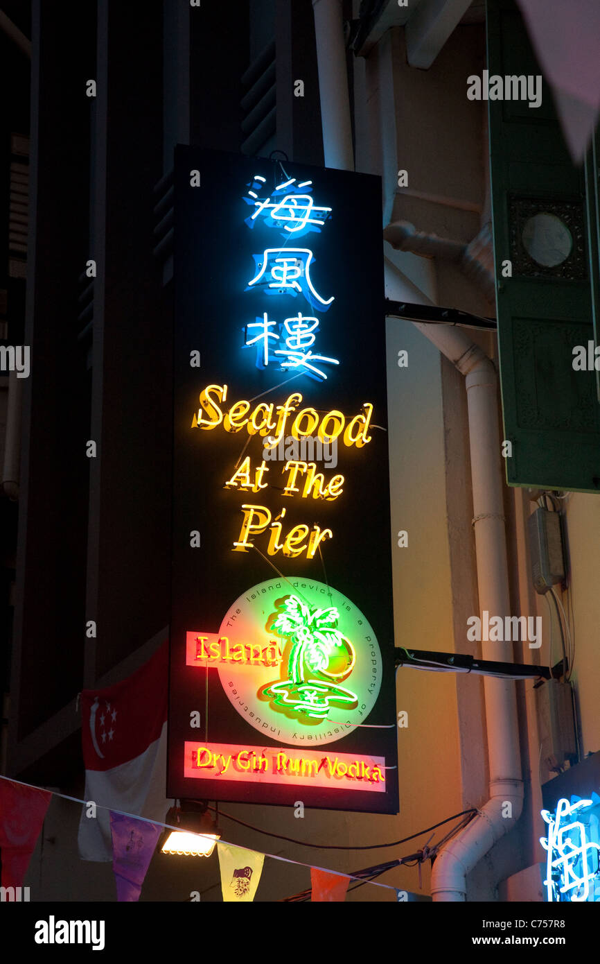 Neon lit signs for seafood restaurants, Boat Quay, Singapore asia Stock ...