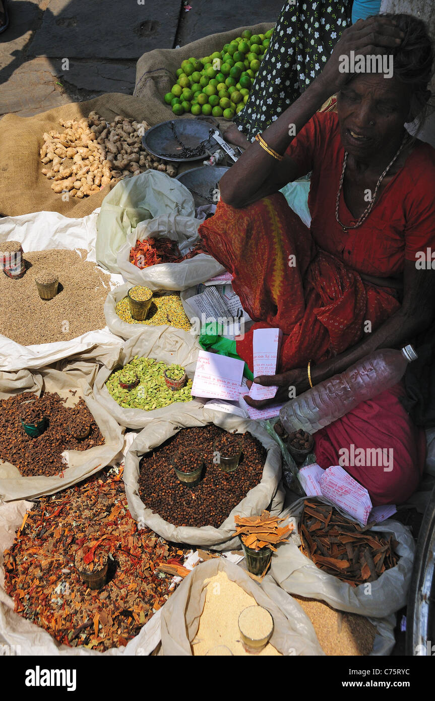 Woman selling spices on the street on the hot day Stock Photo - Alamy