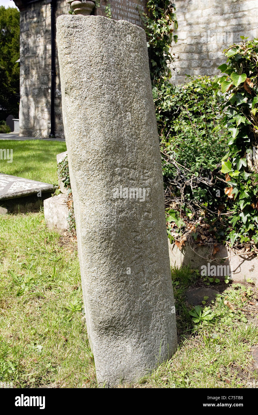A Roman gravestone in the churchyard of St Cian church, Llangian in ...