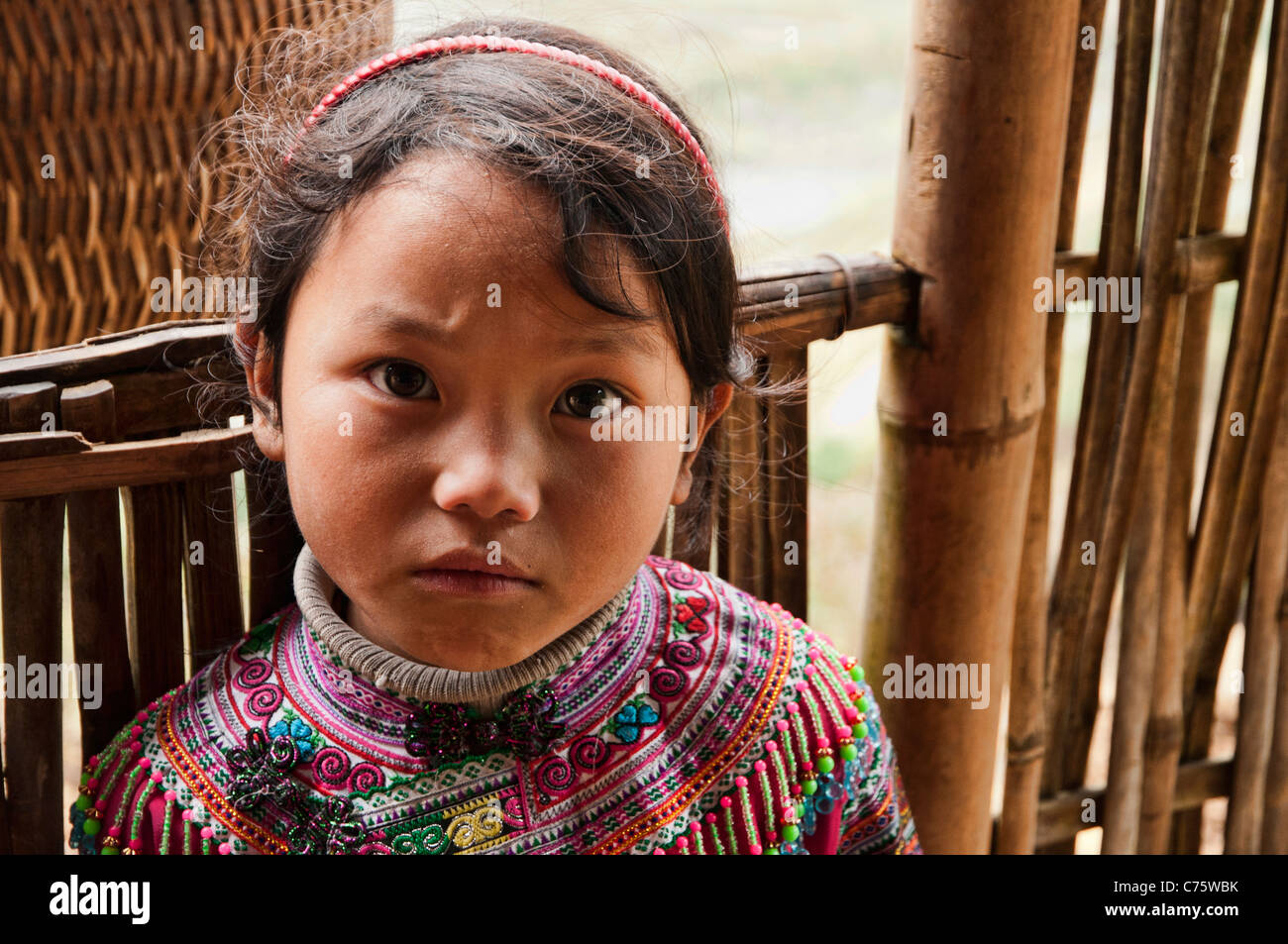 Portrait of a Hmong child in the hills that surrounds Lao Cai at the ...