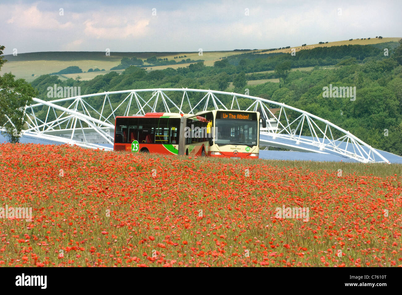 A bendy bus in front of the new Brighton and Hove FC Amex Stadium. The ...