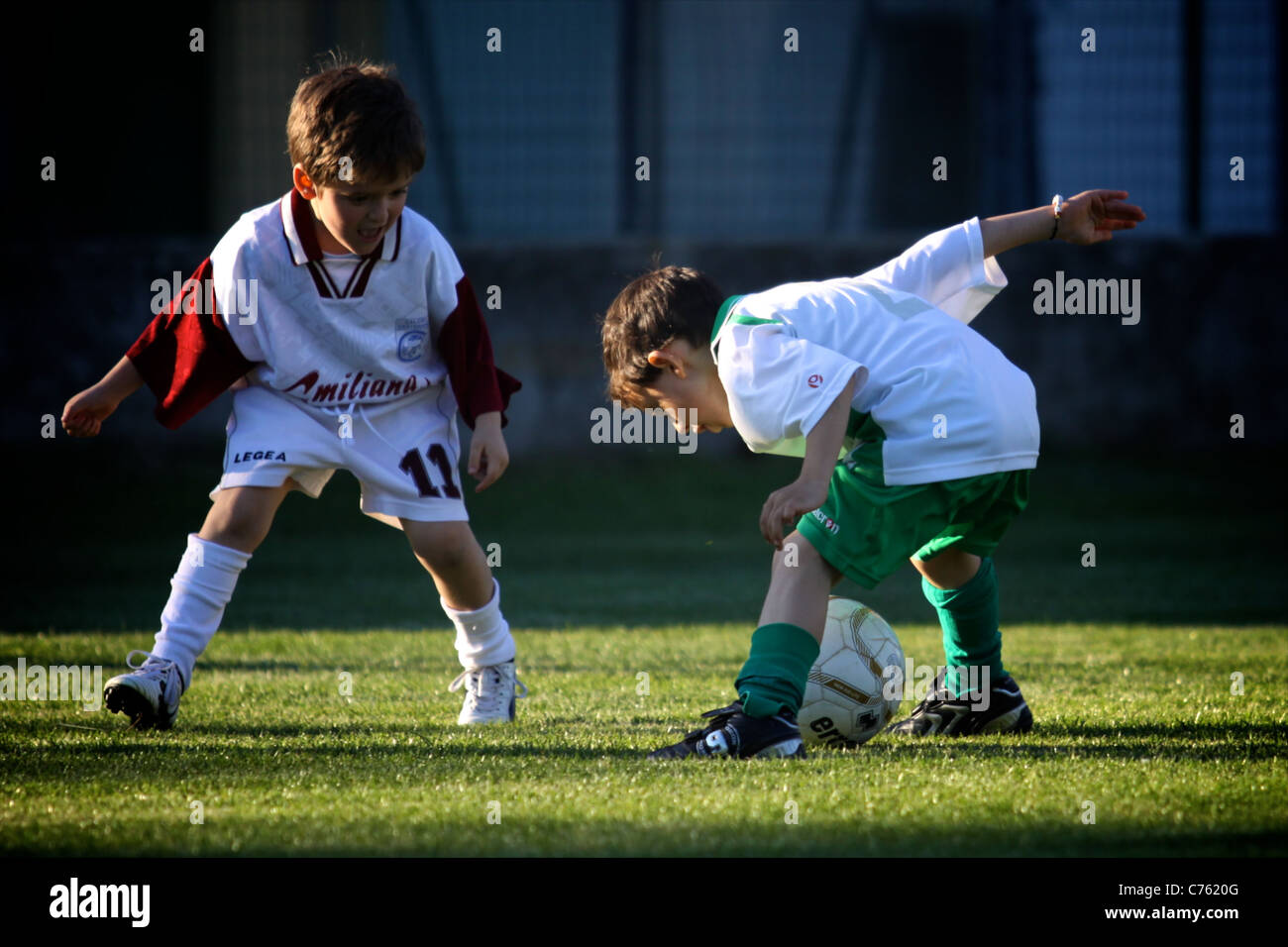 Soccer player stopping soccer ball hi-res stock photography and images ...