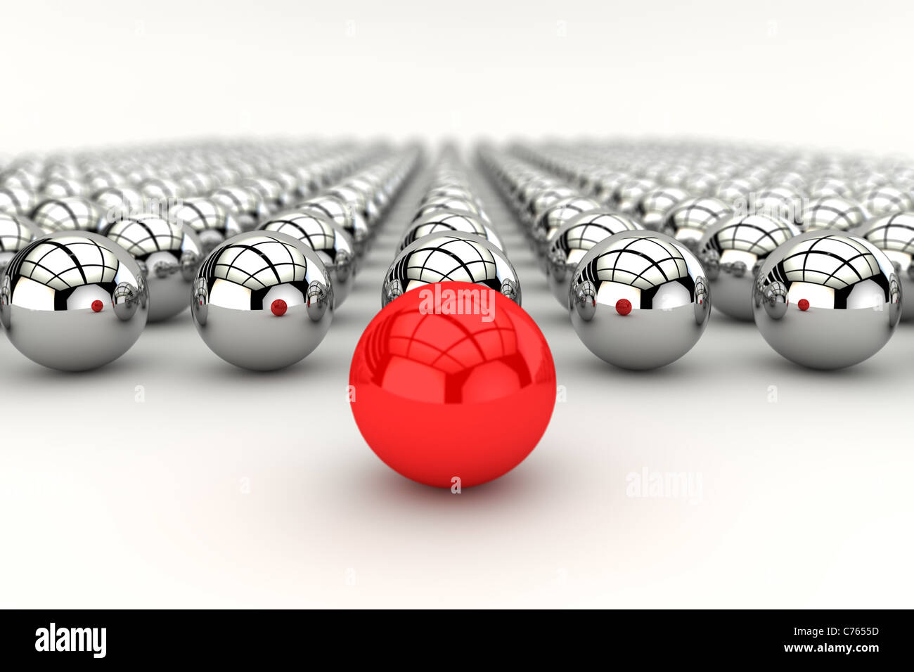 Leadership concept with red sphere and many chrome spheres and depth of ...
