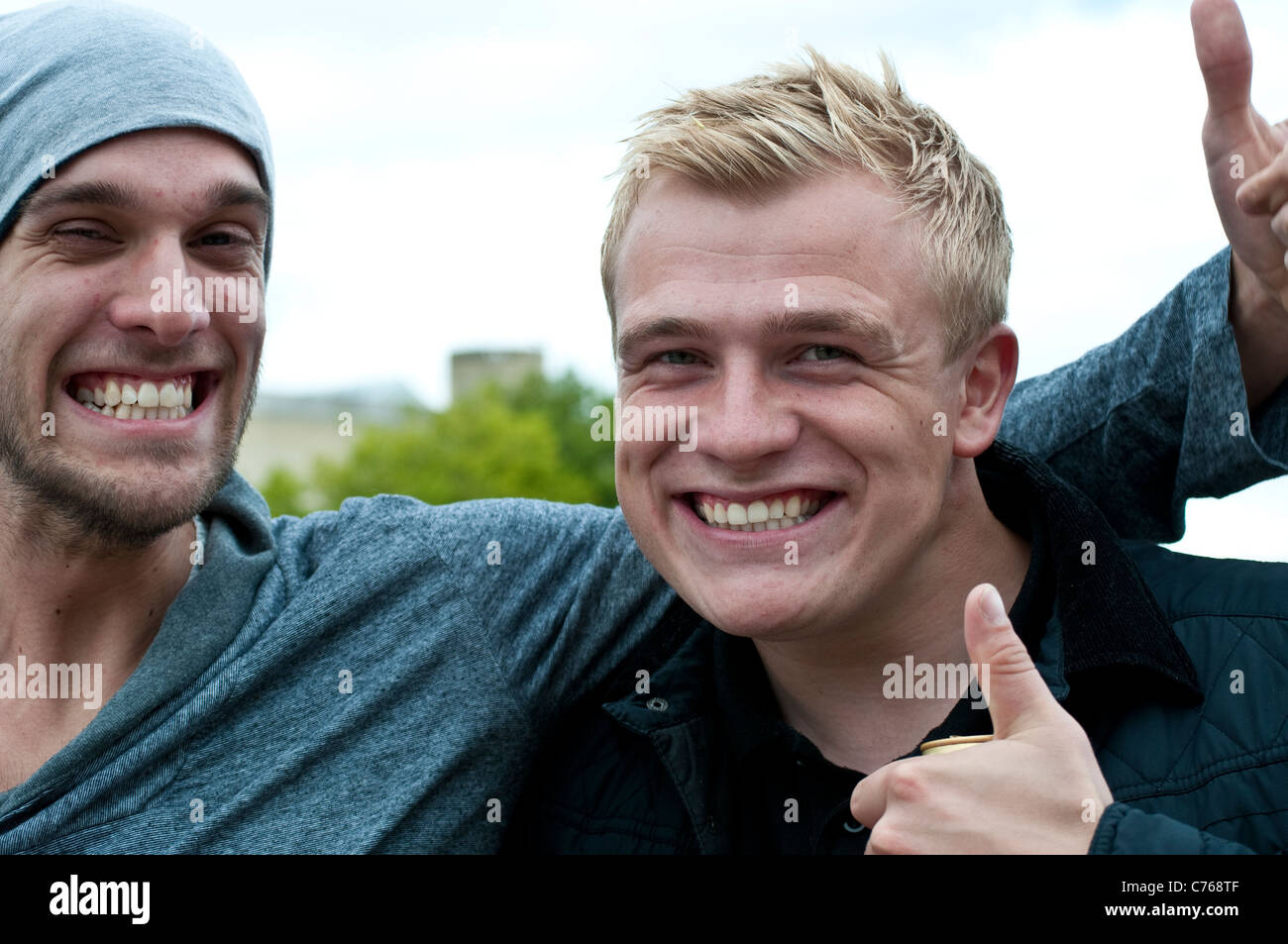 Two smiling young men, Bristol, UK Stock Photo - Alamy