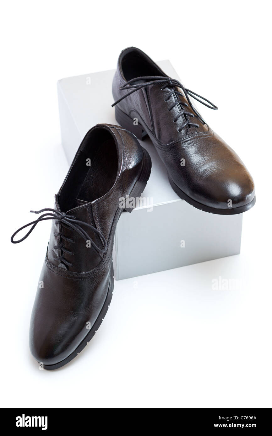 New black shoes with laces and grey box Stock Photo - Alamy