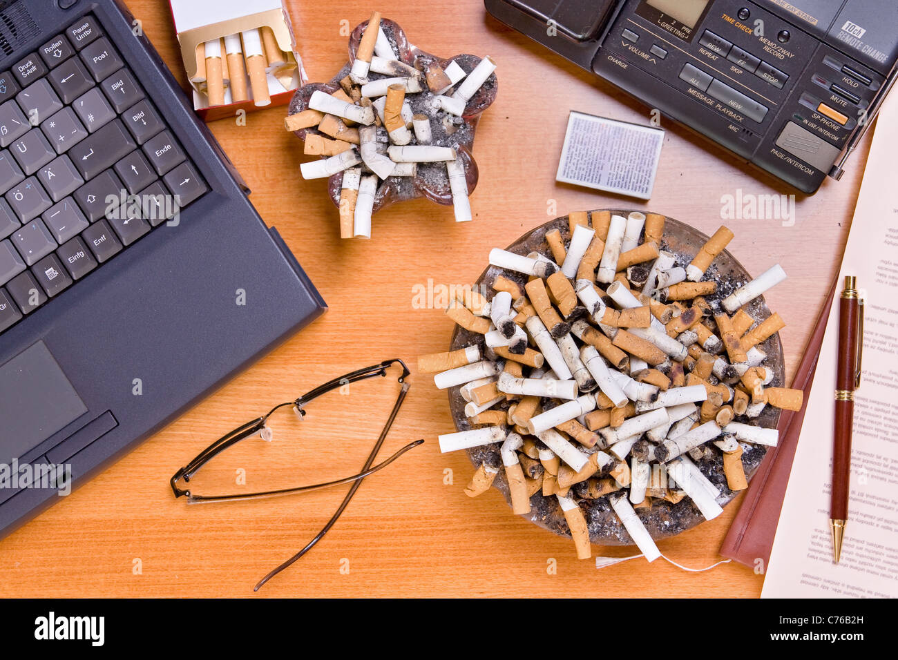 Look at part of office desk smoker Stock Photo - Alamy