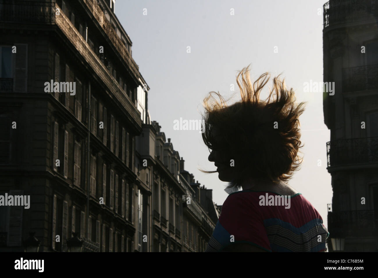 Strong wind blowing woman hi-res stock photography and images - Alamy