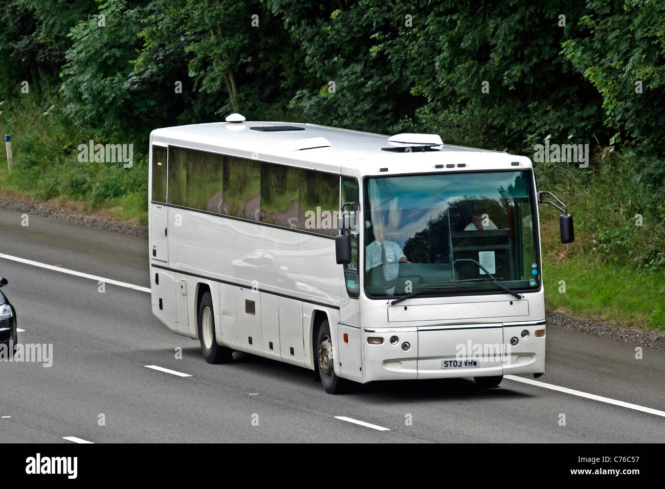 A bus or coach travels along the M4 motorway in South Wales ...