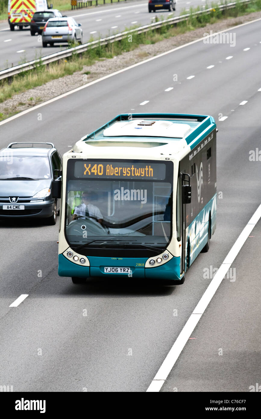 Bus or coach on road Stock Photo - Alamy