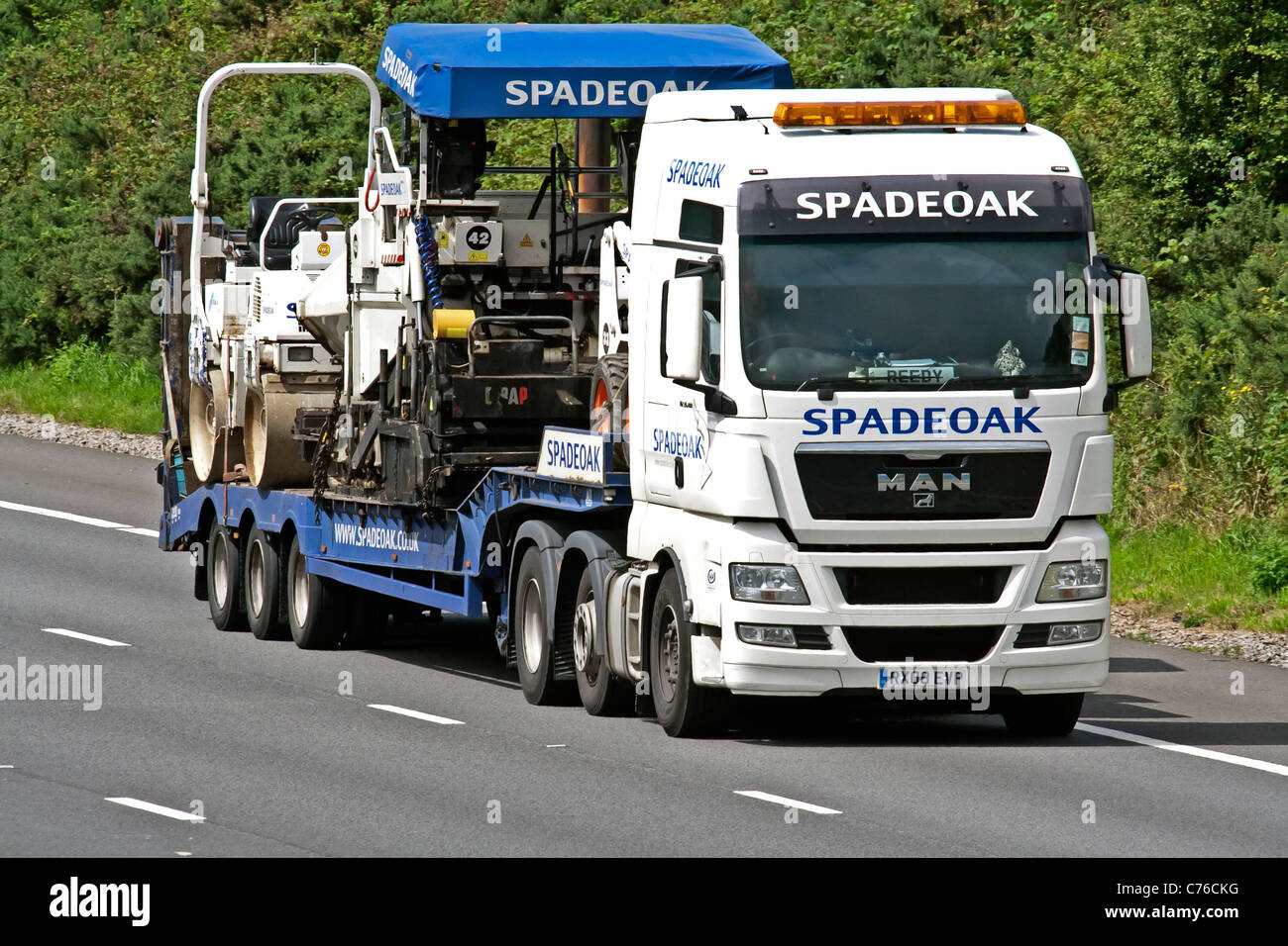 Lorries or trucks on a motorway or road Stock Photo - Alamy