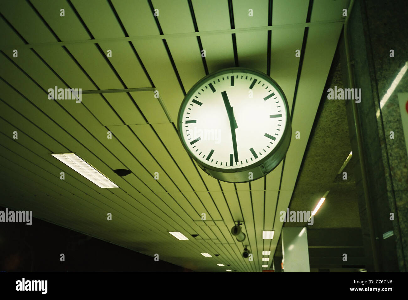 A clock in platform shows 11.30 night, approaching midnight Stock Photo ...