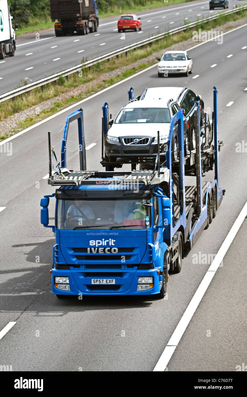 Lorries or trucks on a motorway or road Stock Photo - Alamy