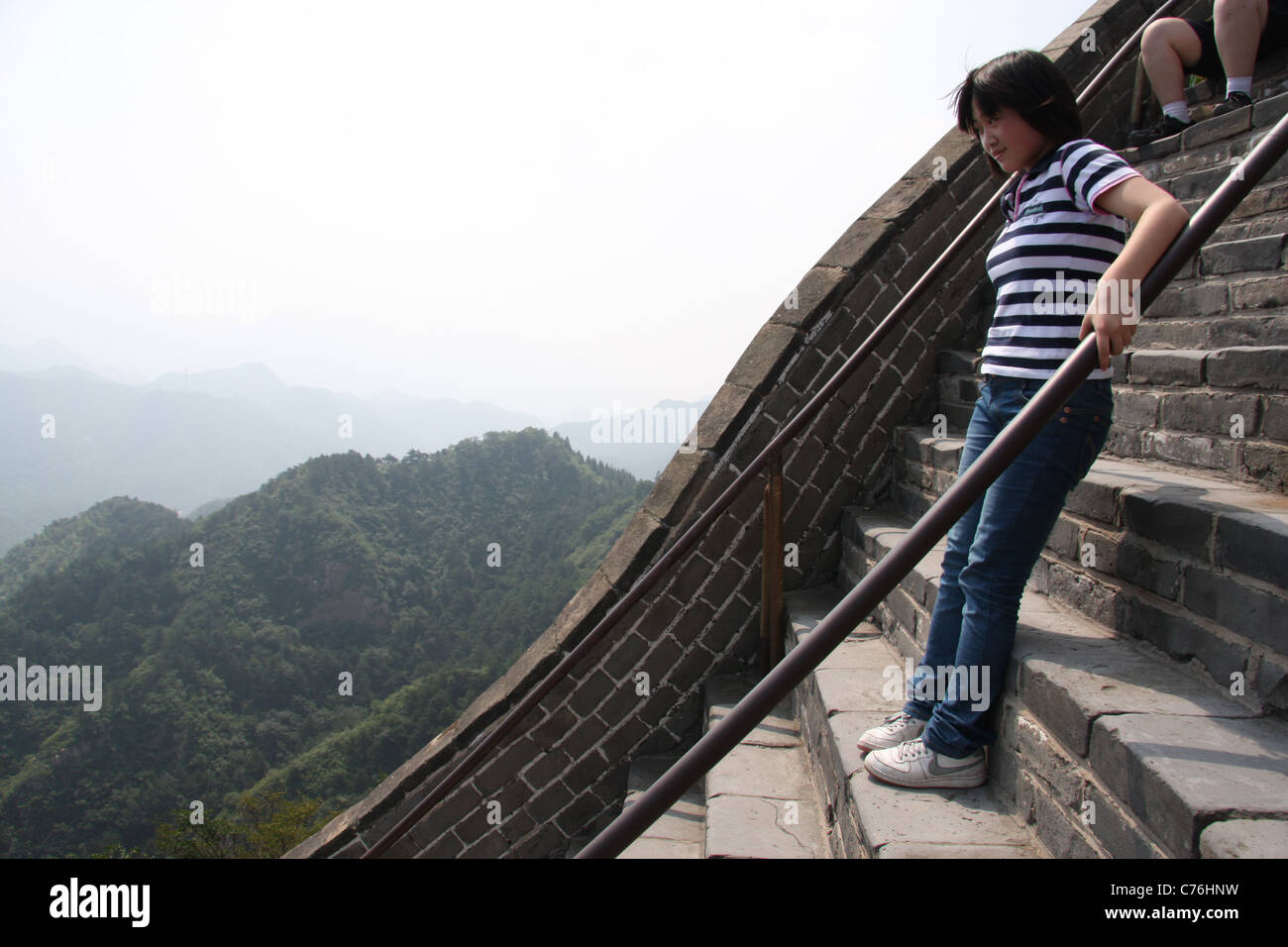A very steep portion of the Great Wall of China, requiring cautious ...