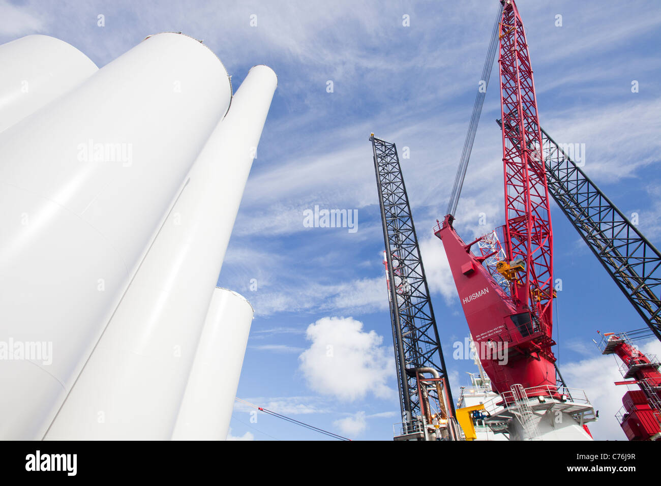 A jack up barge being loaded with wind turbine parts for the Walney ...