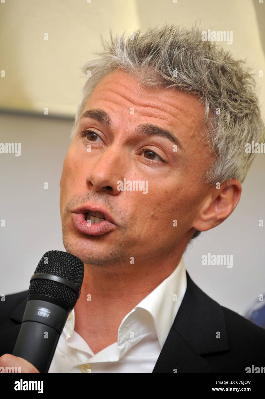 UK, Dorset, Jonathan Edwards CBE, at the topping out ceremony for the ...