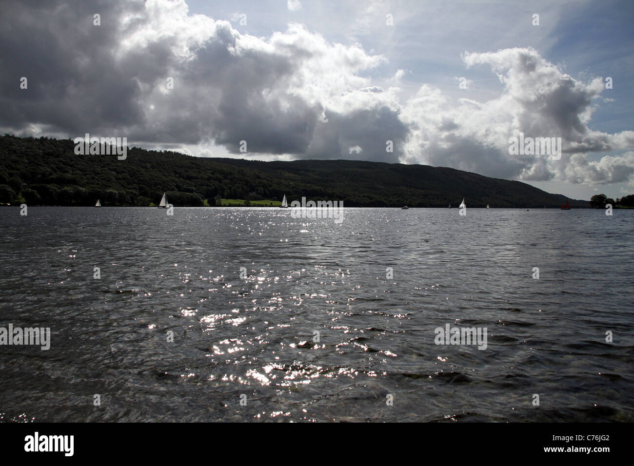 Sun and Clouds over Coniston Water Stock Photo - Alamy