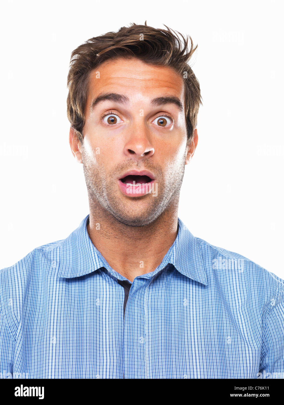 Studio portrait of shocked business man Stock Photo - Alamy