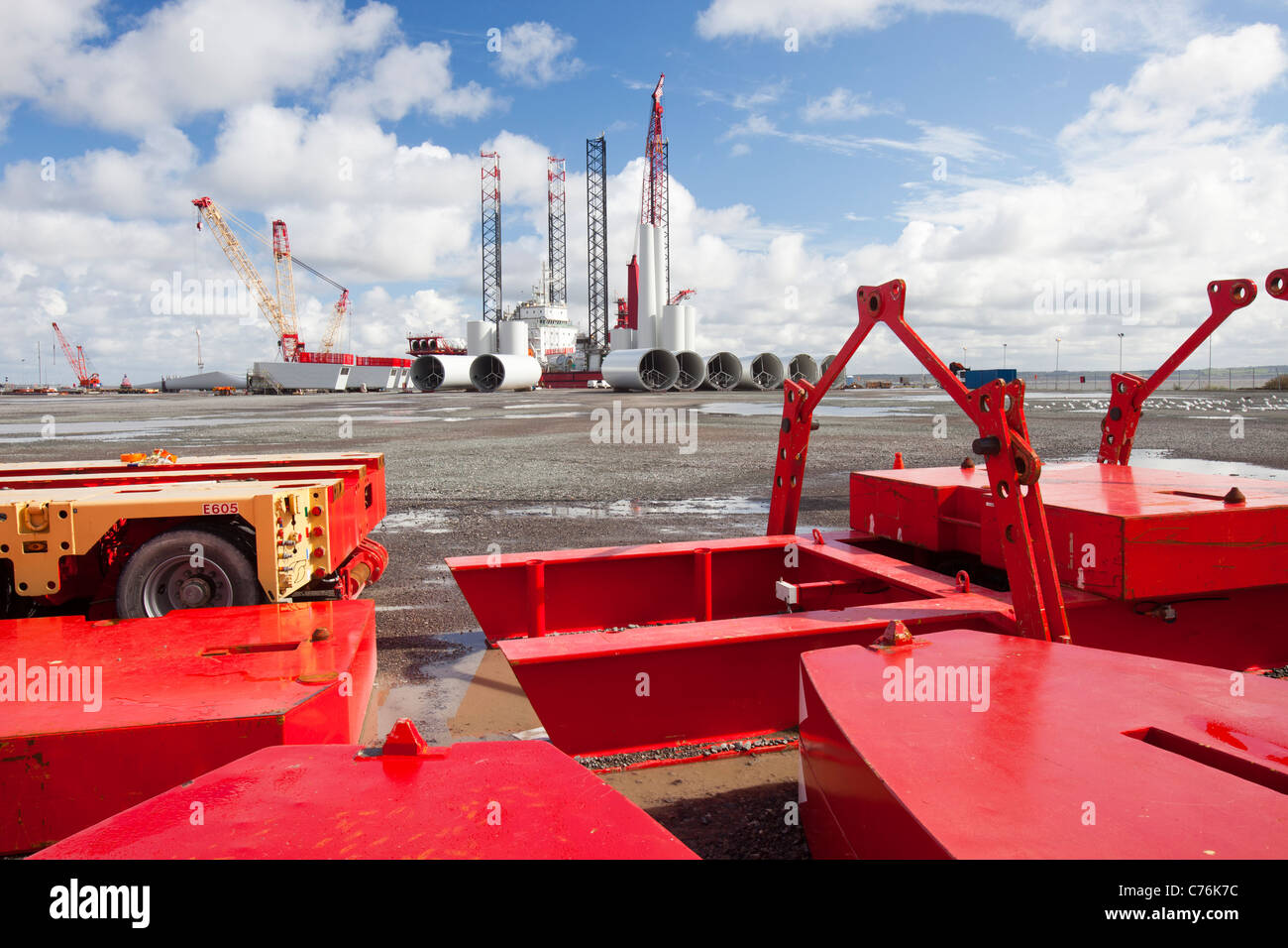 A jack up barge loading with wind turbine parts in Mostyn, for the ...