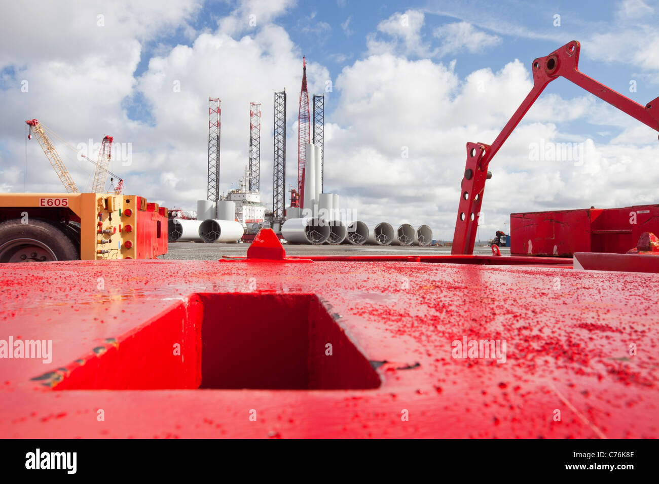 A jack up barge loading with wind turbine parts in Mostyn, for the ...