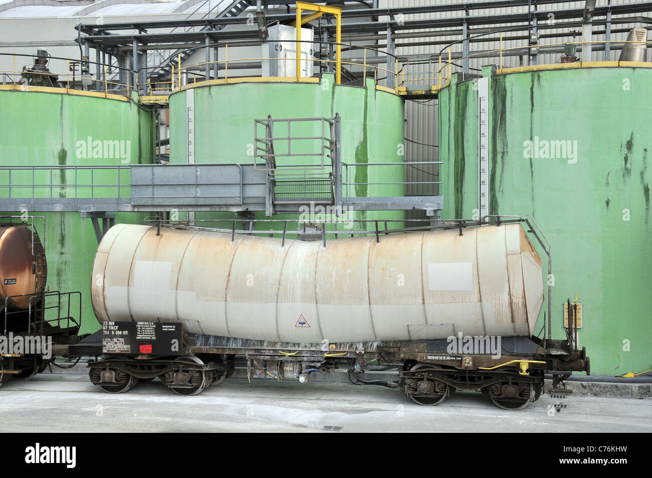 tank wagon contening liquid chalk parked in factory , chemical industry ...