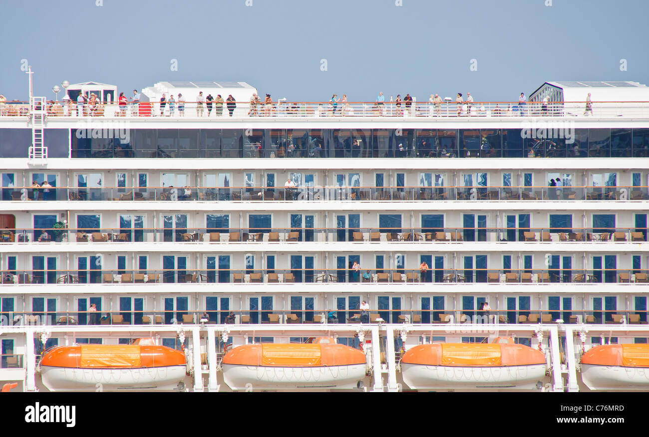 Luxury Cruise Ship with People on all Decks Stock Photo - Alamy