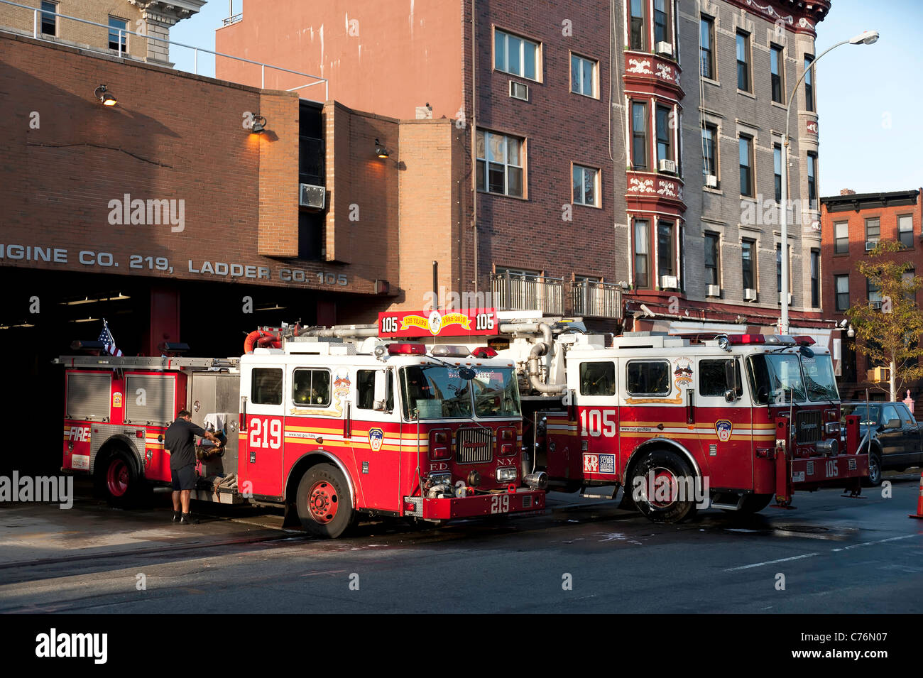 NYC firefights washing a truck Stock Photo - Alamy