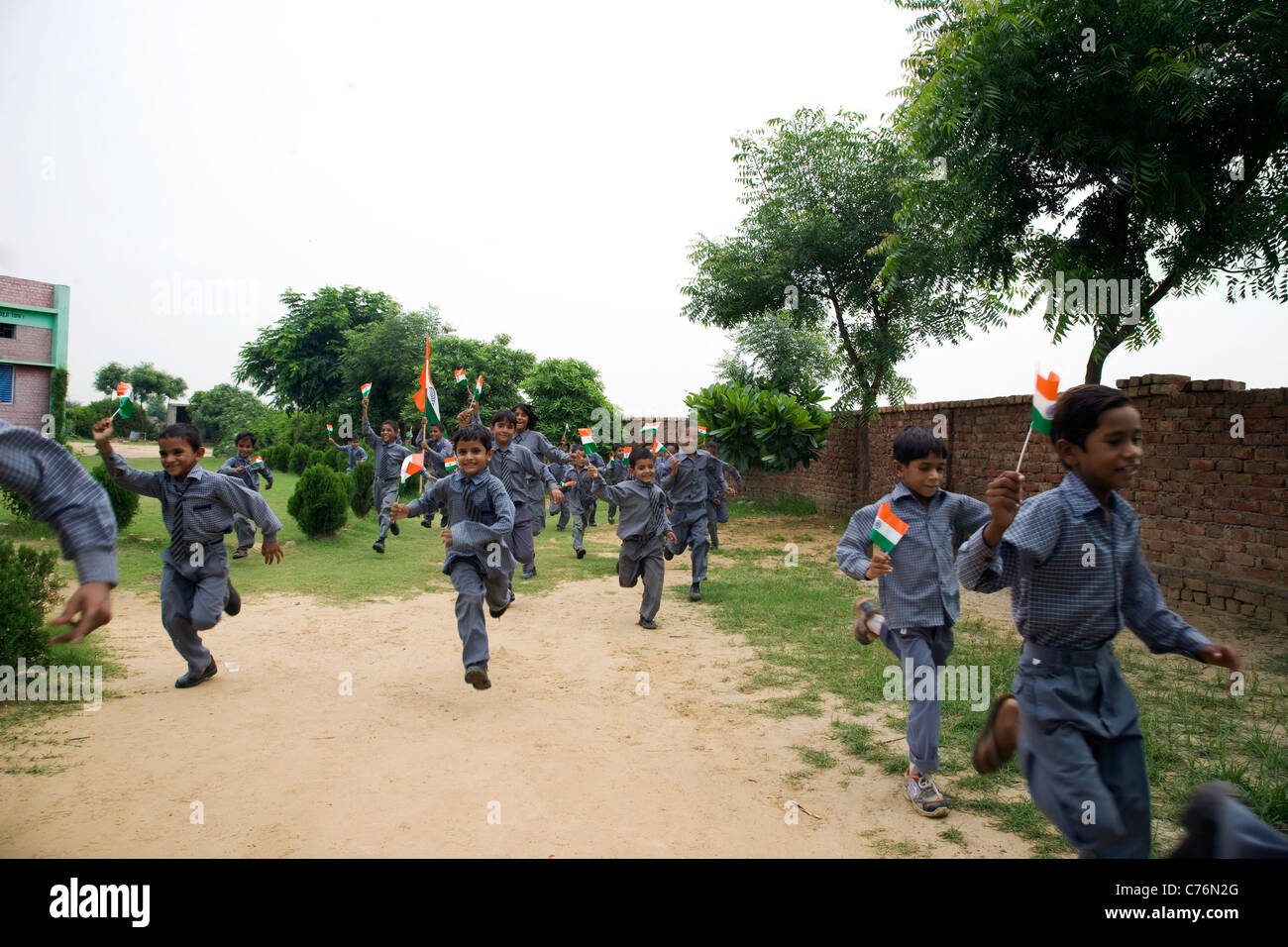 Indian school kids running hi-res stock photography and images - Alamy