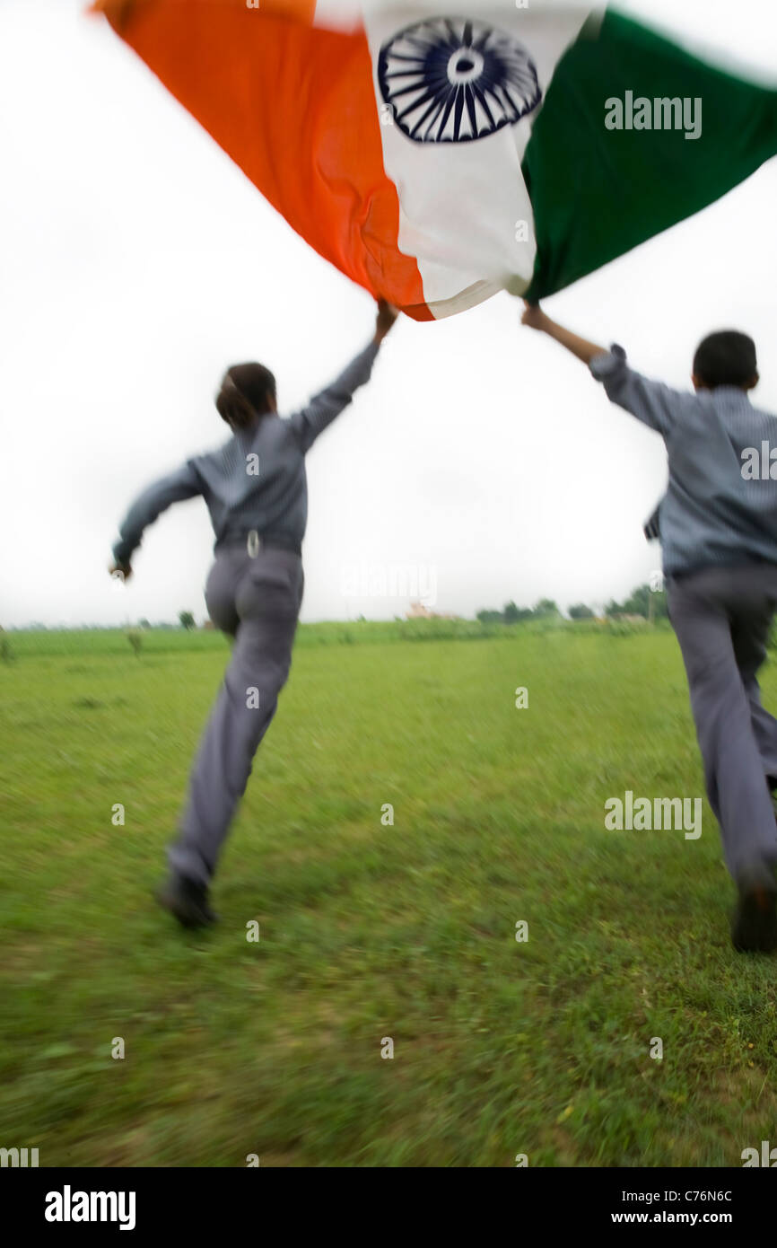 School kids running with the Indian flag Stock Photo - Alamy