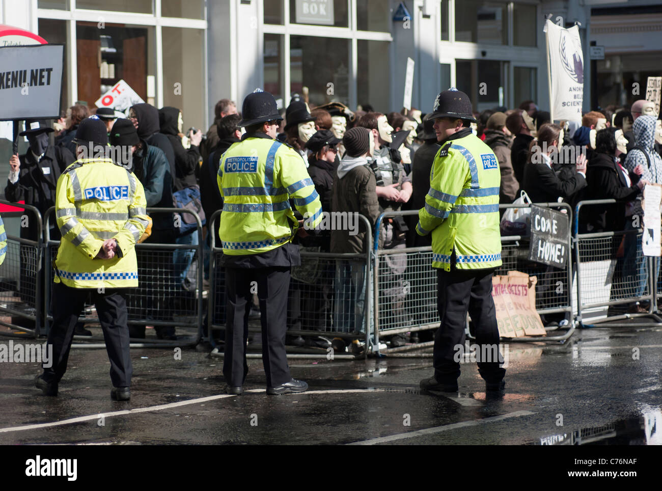 Metropolitan Police constables on duty at an Anonymous protest against ...