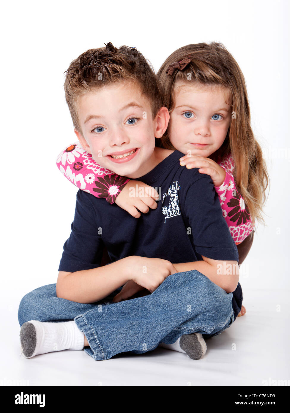 Siblings portrait isolated on a white background Stock Photo - Alamy
