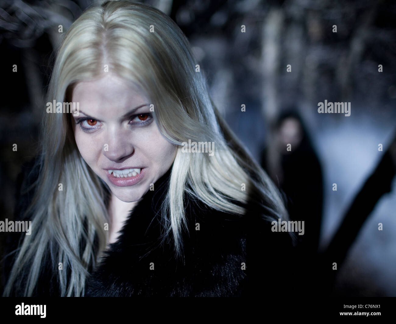 Young attractive blonde vampire woman hi-res stock photography and ...
