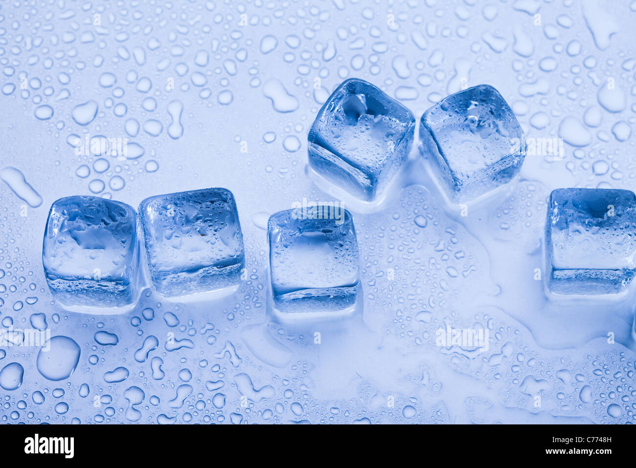 Ice cubes & aqua Stock Photo - Alamy