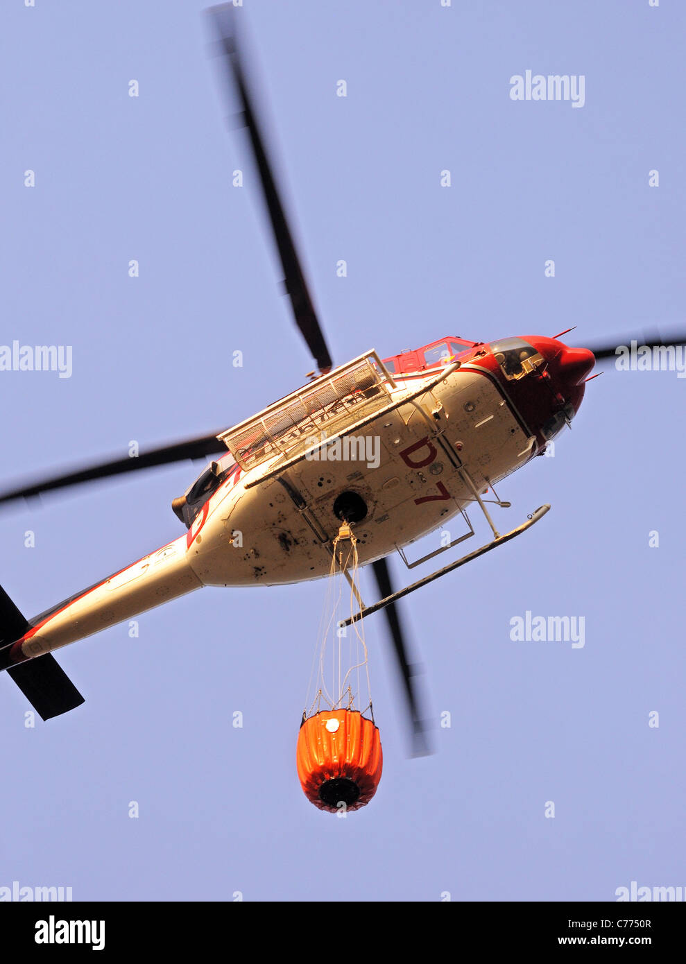 Fire fighting helicopter carrying water hi-res stock photography and ...