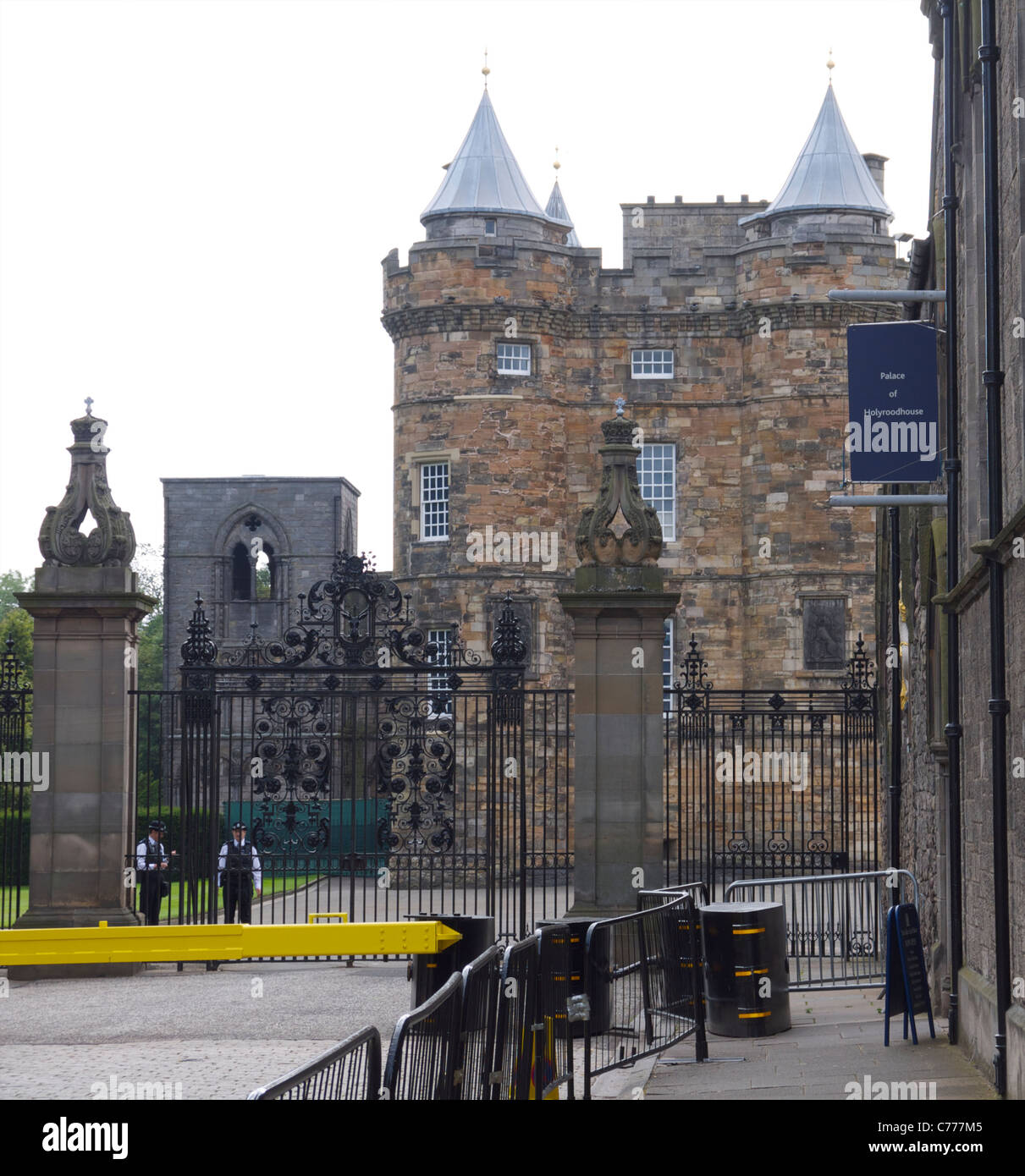 Security gate in front of the Palace of Holyroodhouse in Edinburgh ...