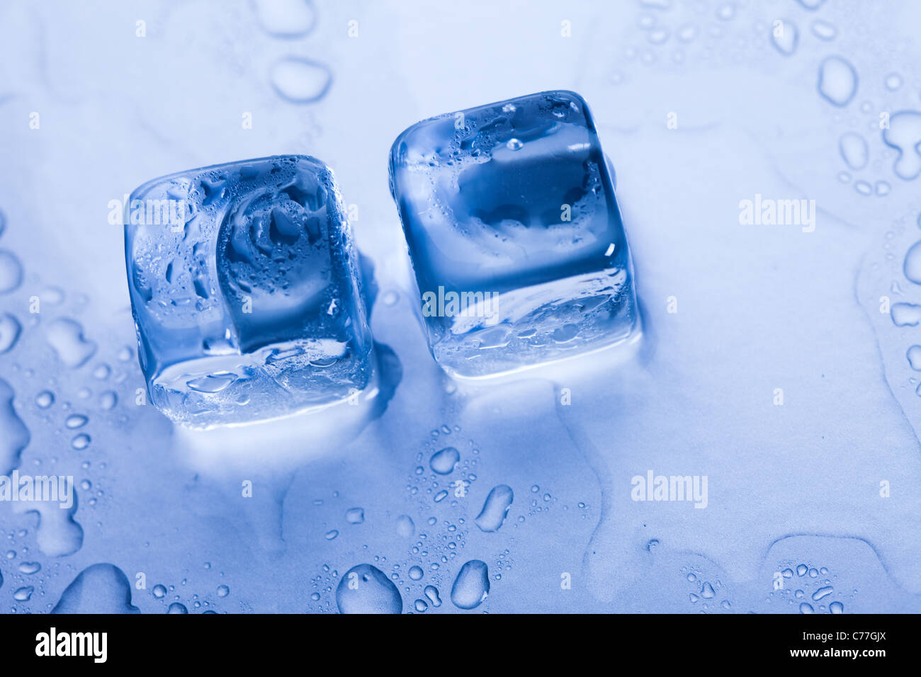 Ice cubes & aqua Stock Photo - Alamy