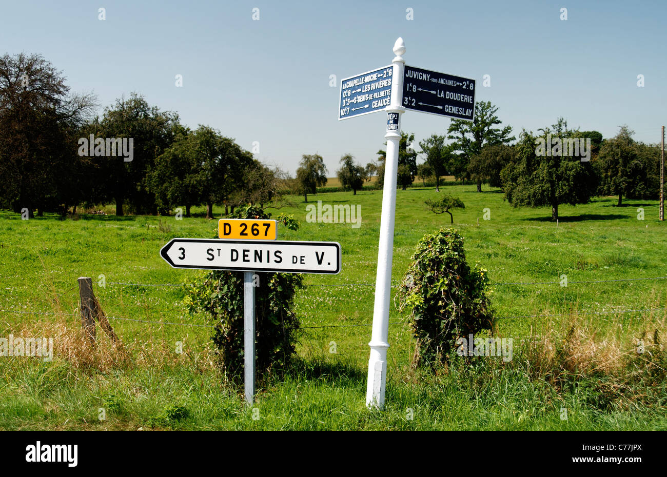 Sign of recent traffic signals and old road sign, department of Orne ...