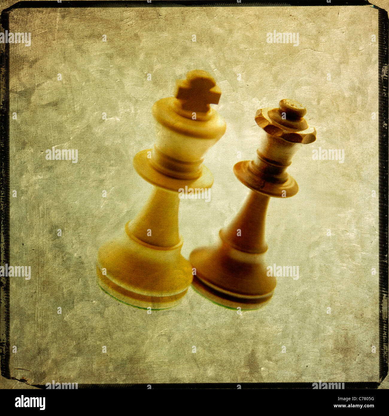 Two chess pieces are prominently displayed, featuring the king and ...