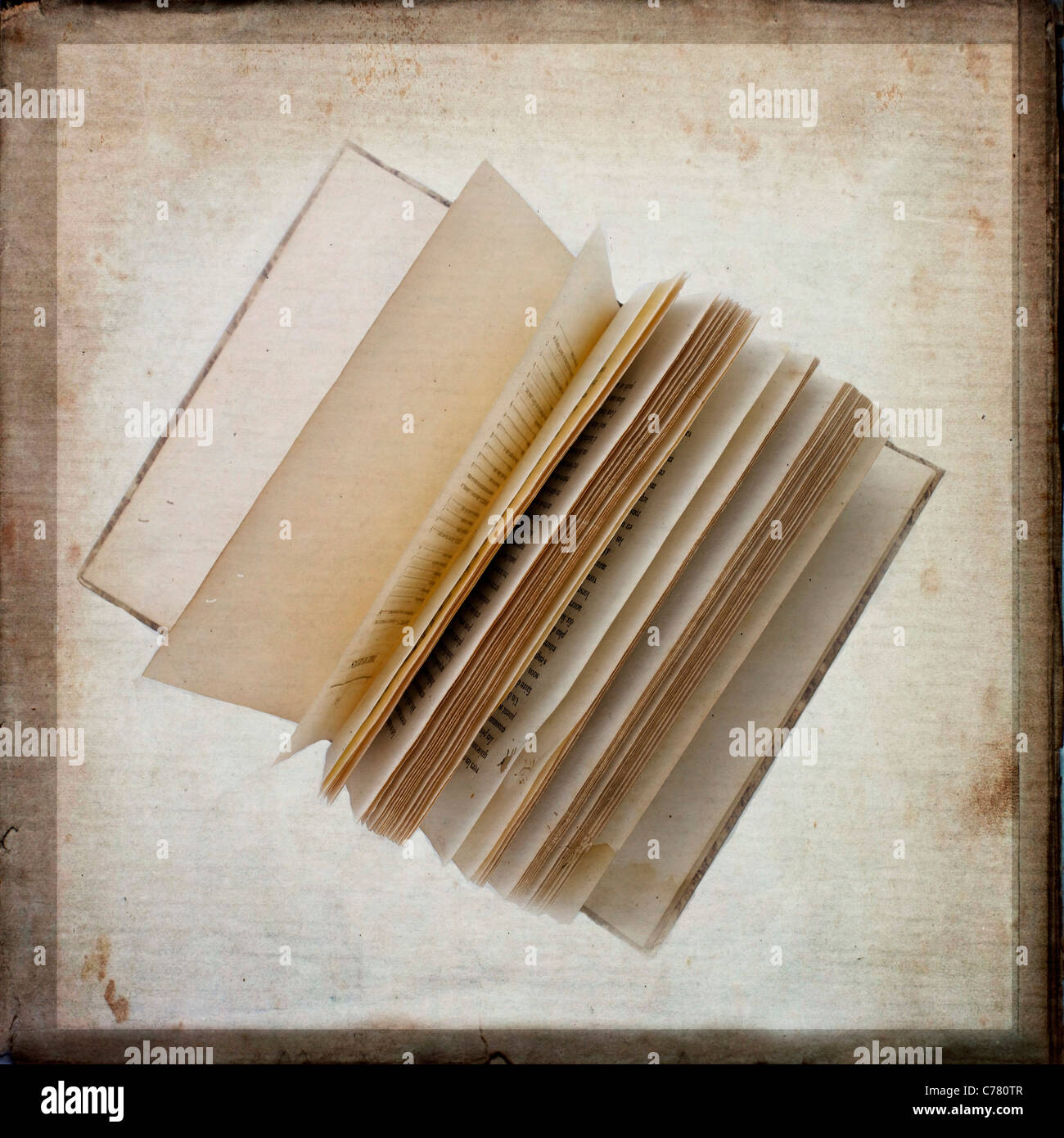 Vintage old book with worn pages open and revealing text, showcasing ...