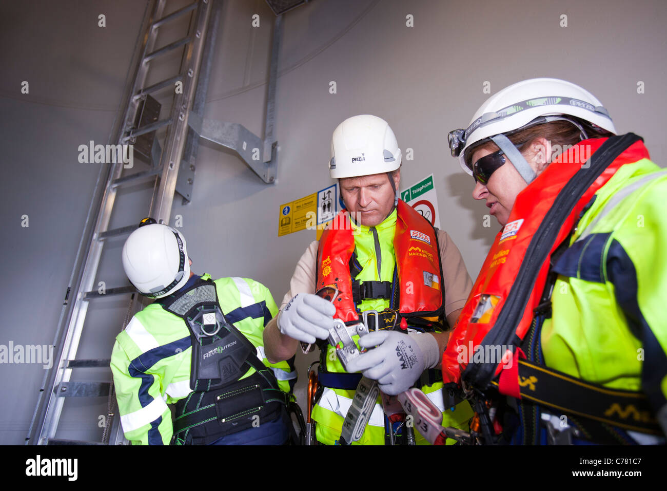 Health and safety workers inside a turbine at the Walney offshore wind ...