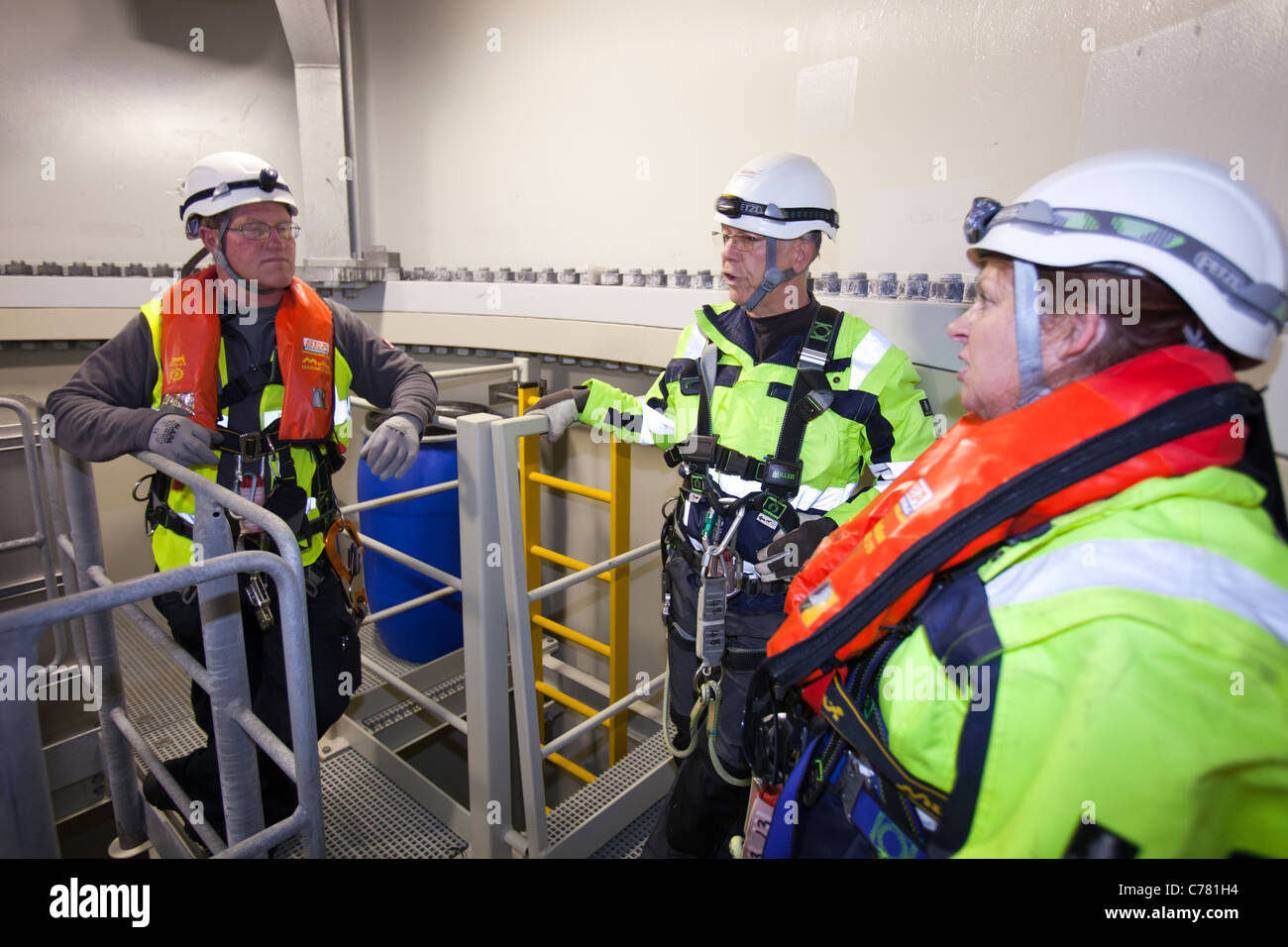 Health and safety workers inside a turbine at the Walney offshore wind ...