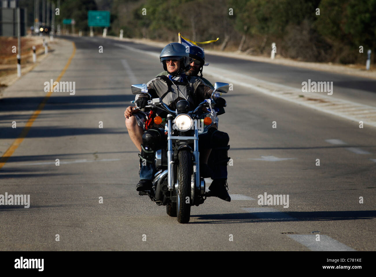 A couple ride on a motorcycle in Southern Israel Stock Photo - Alamy