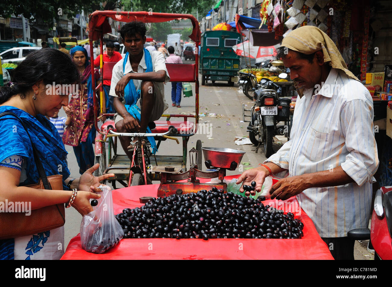 Fruits seller on the street Stock Photo - Alamy