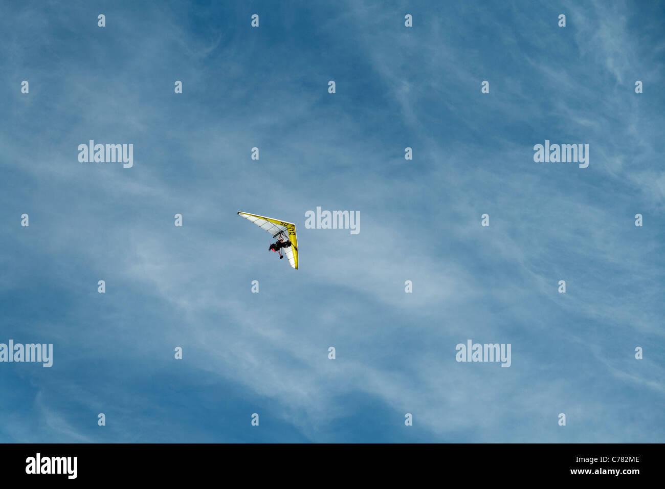 Hand-glider in the blue sky of Carolles (Normandy, France Stock Photo ...