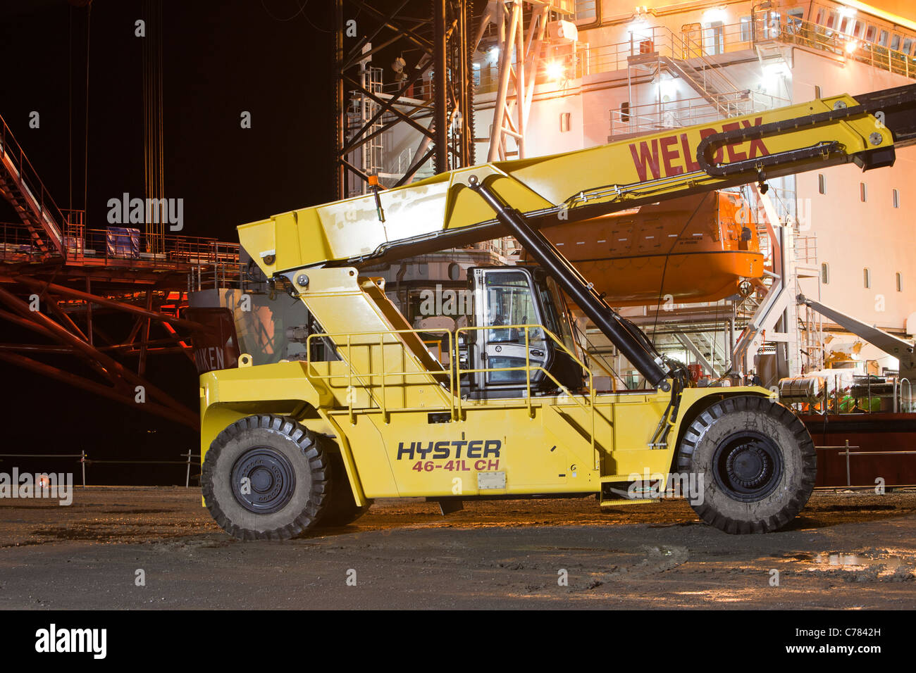 a jack up barge loading wind turbine parts on the docks at Mostyn for ...